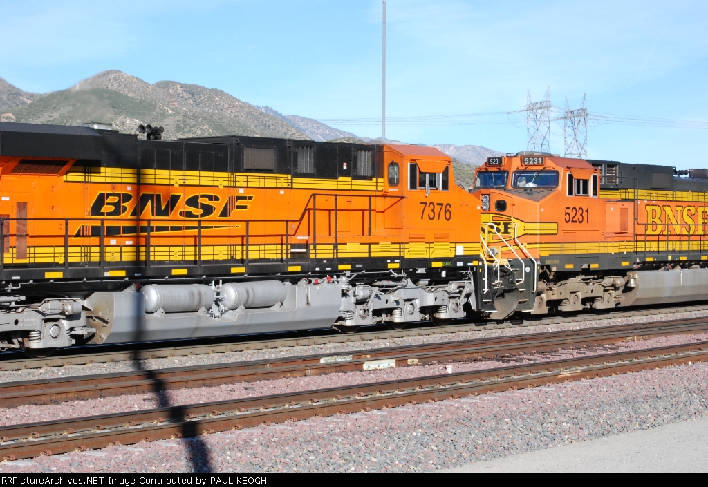 BNSF 7376 3d unit behind BNSF 7803 pulls north in this 8 unit consist.
